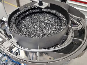 Vibratory bowl feeder to feed and orientate Collets - RNA Automation