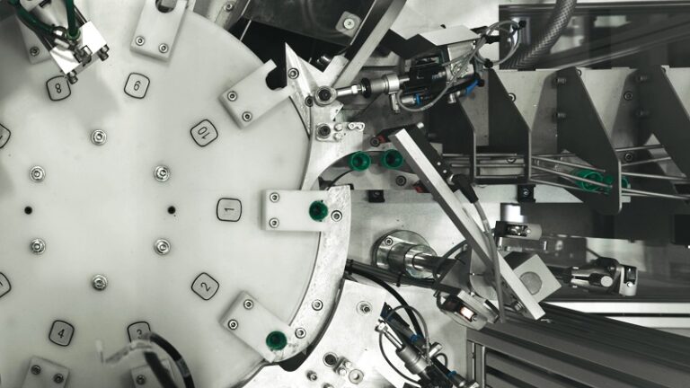 Automated Vial Filling and Labelling Machine - RNA Automation