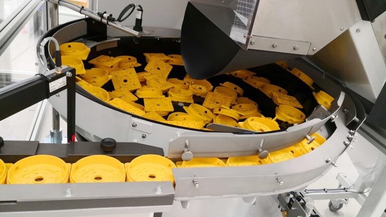 Bowl Feeder to feed and orient Switch Bodies - RNA Automation